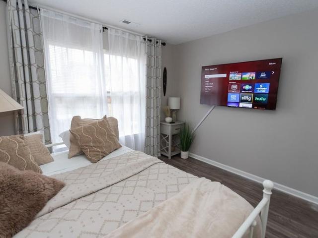 Bedroom with 2 Queen Beds in a Lux 3 Bedroom SFH