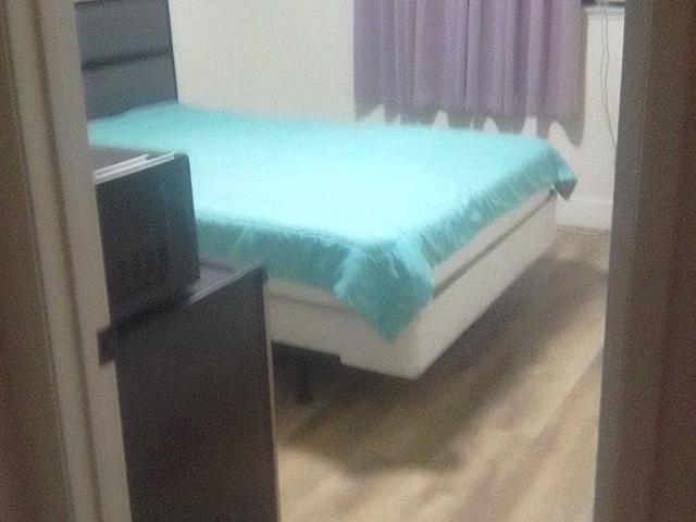 Bedroom with shared living space