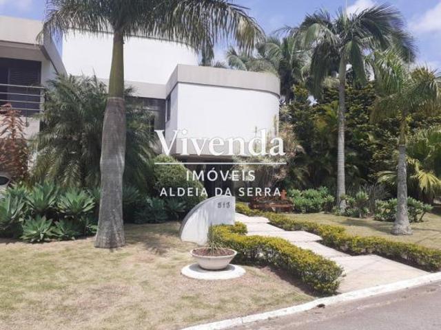 Casa de esquina com 4 suítes, lazer completo e vista para o condomínio