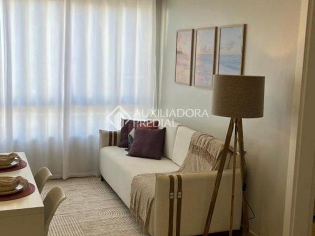 Belíssimo apartamento mobiliado e decorado no Centro de Tramandaí