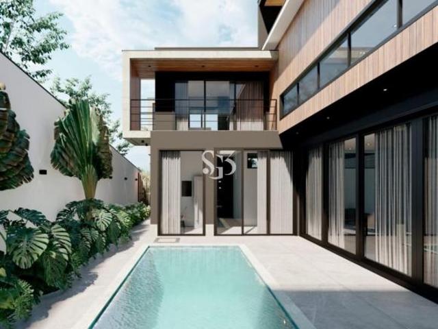 Belíssima casa à venda no Swiss Park em Campinas, SP. Com 3 suítes, 3 salas, acabamento premium e pr