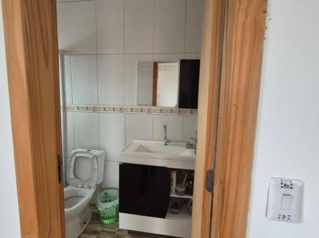 Belíssima casa de 2 dormitórios com um amplo pátio na cidade de Passo Fundo
