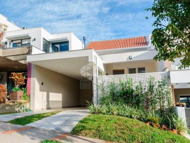 Belíssima Casa em Condomínio fechado com 3 dormitórios no bairro Vila Nova em Porto Alegre, RS