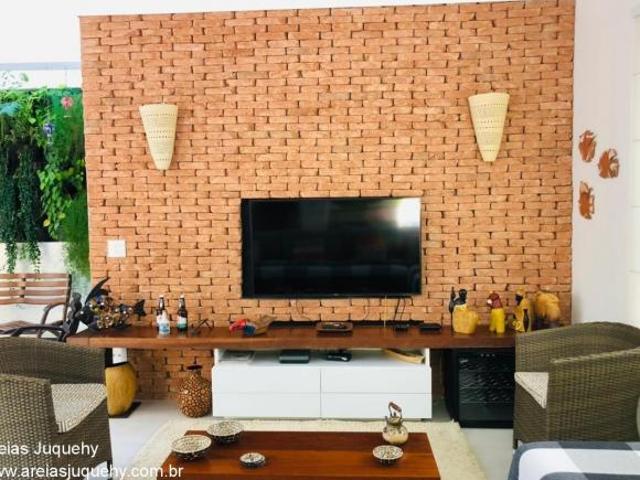 Belíssima casa em condomínio próximo a praia