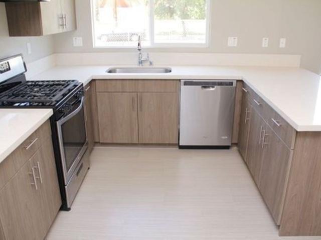 Big and Beautiful 4 bedroom, 3 bath + loft townhouse in gated community. Must see!