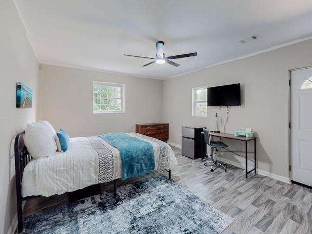 BRAND NEW Very clean & newly updated Decatur property with Smart TVs & mini fridges in every room!