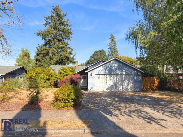 Bright 3BR Beaverton Home with AC, 2 Car Garage & Fenced Yard