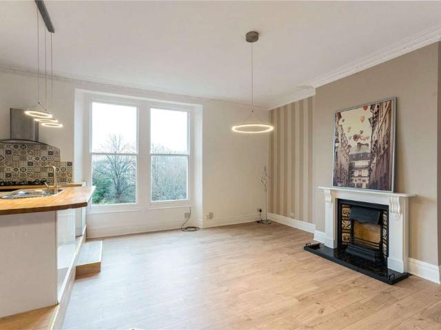 Bright and spacious first floor three bed apartment with parking space