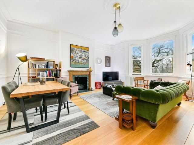 Bright and spacious 2 bedroom 2 bathroom first floor apartment with two balconies in the heart of Belsize Park NW3