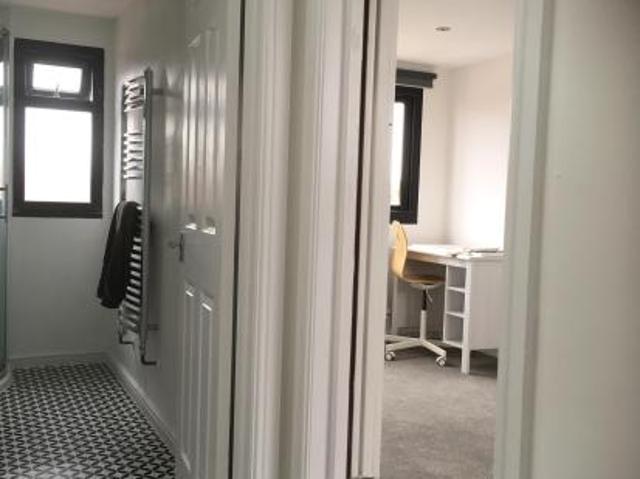 Bright airy loft room with en suite