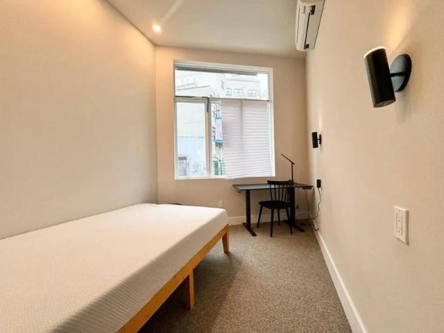 Bright Room by Central Park with Desk and Dresser