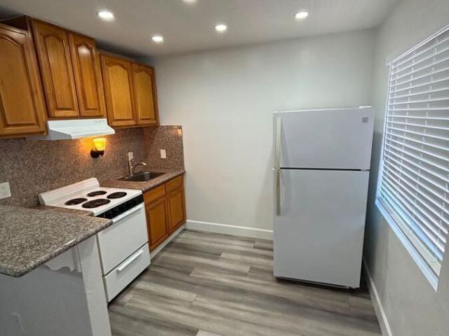 Bright & Updated Apartment Near Lake Merritt | Hardwood Floors