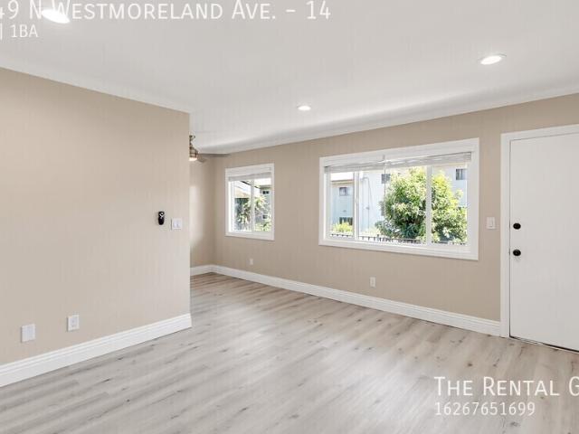 Bright Upper Unit | Newly Updated | Gated Parking Included |Great Virgil Village Location! | Move In Special