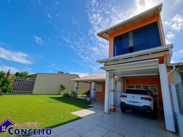 C1086 Excelente residência com 04 dormitório na região Central de Imbé
