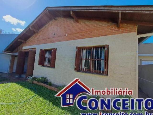 C1015 Ótima residência com piscina e anexo localizada no Centro de Imbé