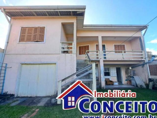 C394 Ótimo sobrado com 02 apartamentos no balneário Albatroz