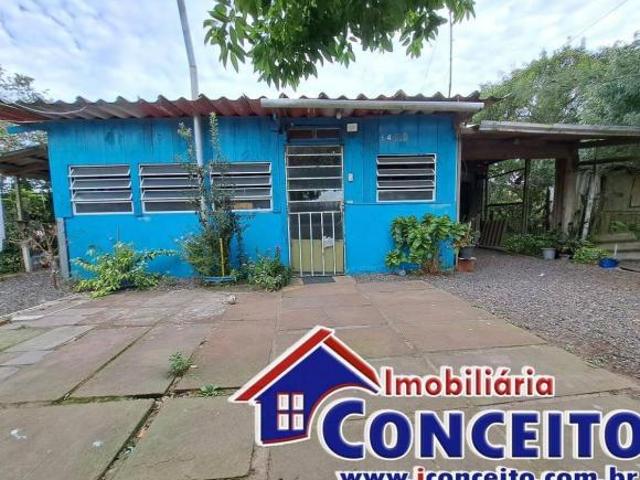 C481 Residência de madeira localizada em região de moradores