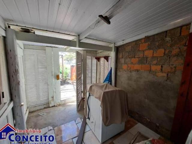 C607 Residência mista em região de moradores no balneário Albatroz
