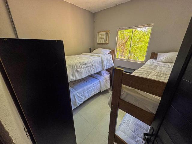 cama compartilhada em pousada hostel