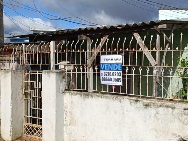 Casa mista 6 quartos e 3 vagas no bairro Santa Rosa