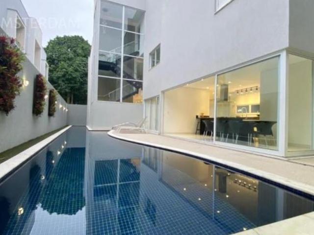 Casa mobiliada à venda no M5 na Riviera, 5 suítes, 4 vagas, piscina aquecida, elevador com 513,80 m