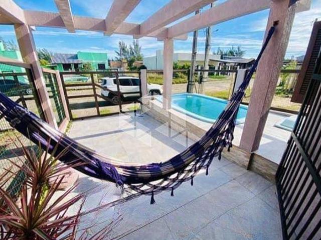 CASA MOBILIADA COM 3 DORMITÓRIOS, 1 SUÍTE, MEZANINO, PISCINA, ÁREA GOURMET 1 QUADRA DO MAR COM VISTA