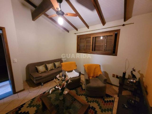 Casa mobiliada com 3 dormitórios, sendo 1 suíte, no bairro Auxiliadora COD: 23069