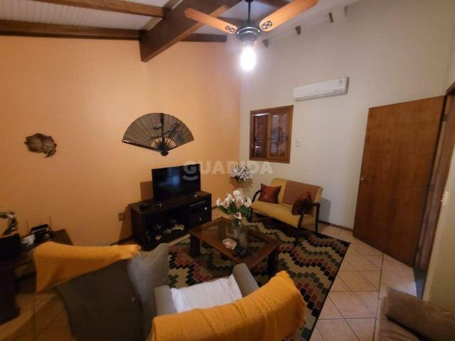 Casa mobiliada com 3 dormitórios, sendo 1 suíte, no bairro Auxiliadora COD: 23069