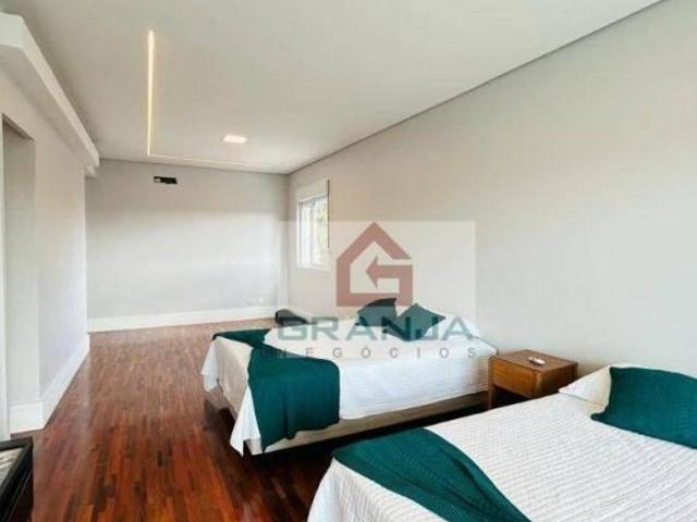 Casa mobiliada de alto padrão à venda no Reserva Santa Maria em Jandira | 4 suítes, 2 piscinas, 557