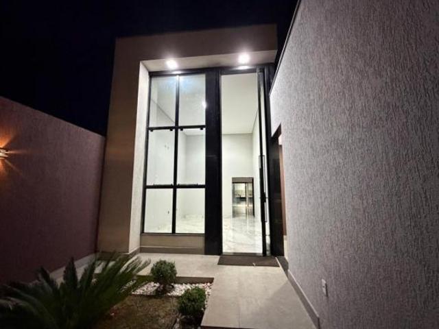 Casa Moderna com 3 Suítes, Pé Direito Alto e Área de Lazer Independente em Condomínio Fechado