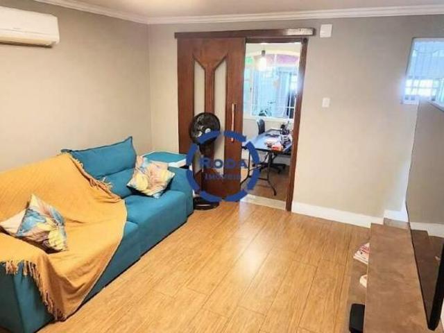 Casa Moderna com 3 Quartos e Área Gourmet em Localização Privilegiada