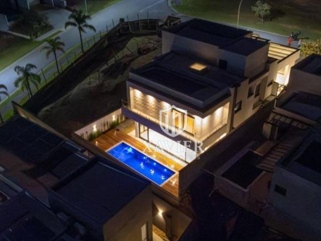 Casa Moderna com 4 Suítes, Escritório, Espaço Gourmet e Piscina Aquecida – Alto Padrão e Valor Atrae