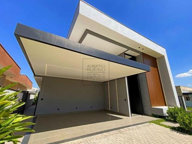 Casa moderna no Portal dos Bandeirantes, Salto | 3 suítes, área gourmet e piscina por R$1.800.000