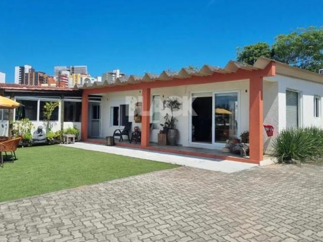 Casa na beira do rio Torres RS