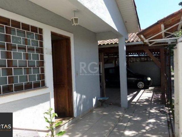 Casa na Hípica com 3 dormitórios e 2 vagas