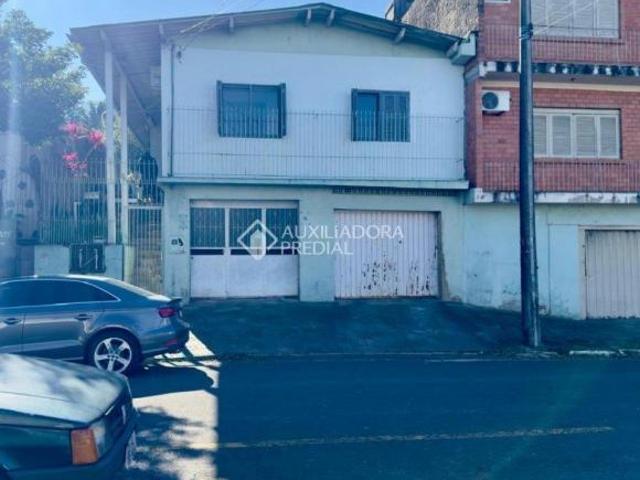 Casa na rua Charrua bairro Liberdade com 3 quartos sendo 1 suíte