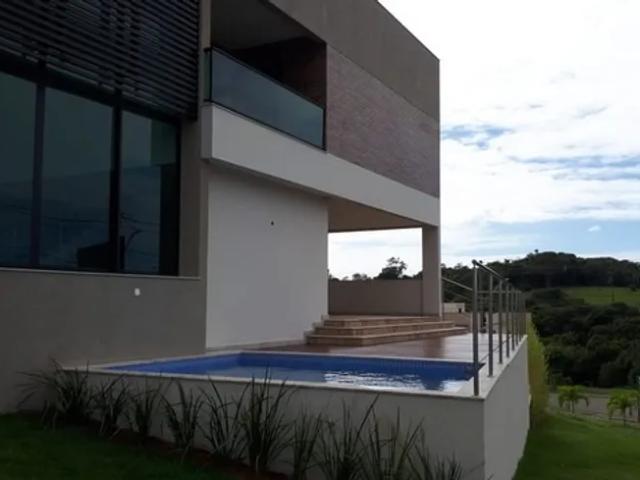 Casa no alphaville 2 com 4 suítes, sala de estar e jantar e piscina