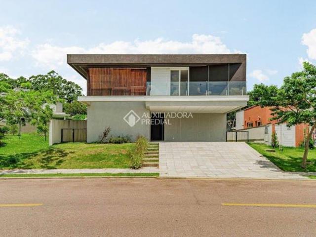 Casa no Alphaville Vêneto Porto Alegre semi mobiliada, 4 Suítes, com piscina