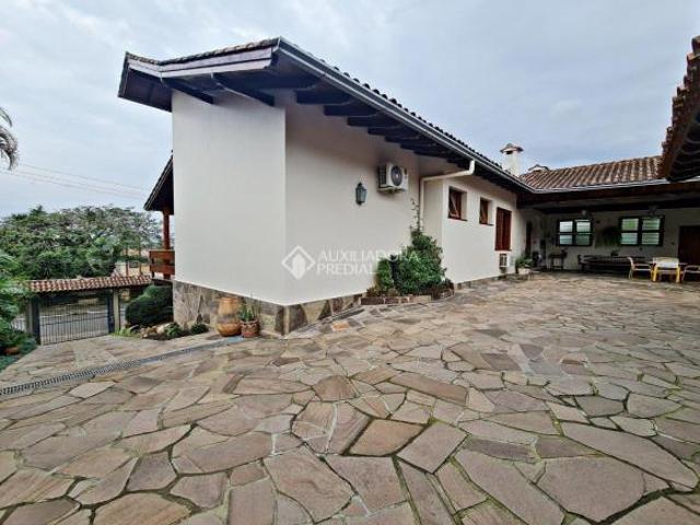 Casa no bairro Vila Nova em Novo Hamburgo com 3 dormitórios