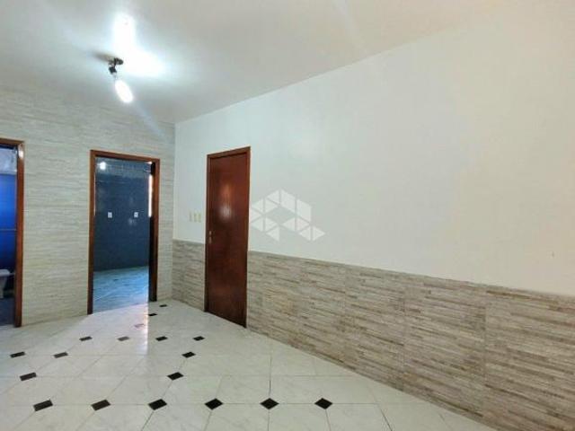 Casa no bairro Harmonia em Canoas com estrutura para segundo piso aceita financiamento e FGTS po