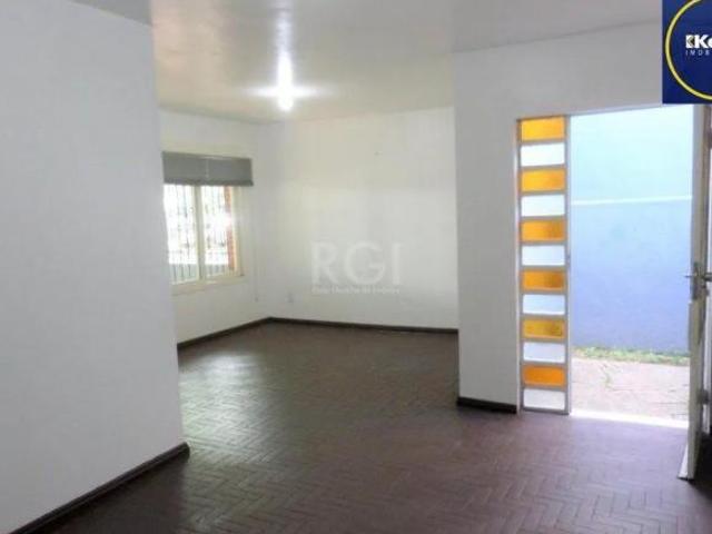 Casa no bairro Jardim Botânico de 3 dormitórios e 2 vagas