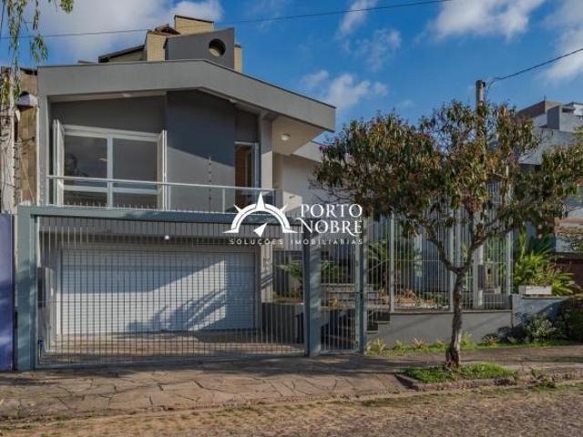 CASA NO BAIRRO JARDIM LINDÓIA COM 3 DORM. LIVING INTEGRADO LAREIRA E PISCINA