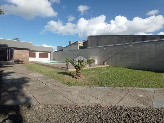 Casa no bairro Niterói com 4 dormitórios, 2 suítes e piscina com terreno 11x50