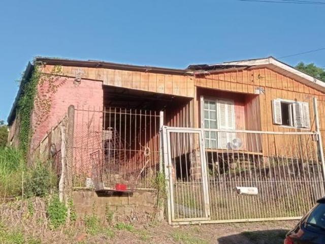 Casa no bairro Pitinga 3 dormitórios 2 banheiros