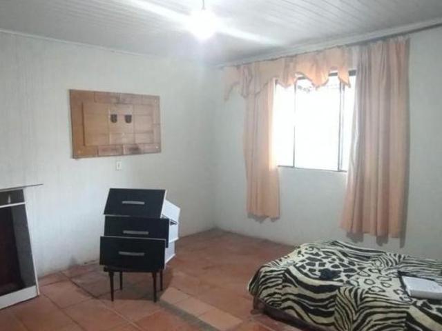 Casa no bairro Restinga 4 dormitórios