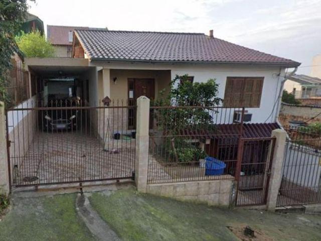 Casa no bairro Santa Fé com 3 dormitórios e 3 vagas
