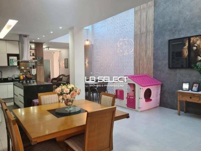 Casa no bairro Santa Rosa com quatro quartos, uma suíte e área gourmet