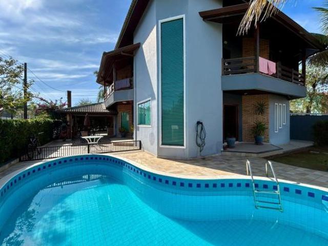 Casa no Bougaiville 1 em Peruíbe, Possui 4 dormitórios e piscina