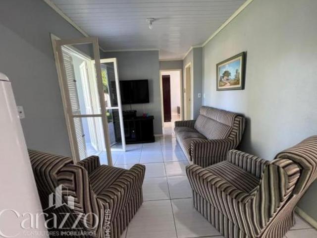 Casa no Centrinho de Nova Tramandaí com 03 dormitórios