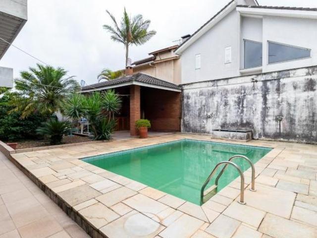Casa no condomínio Condomínio Residencial Morada Das Flores para venda com 4 quartos, sendo 2 suítes